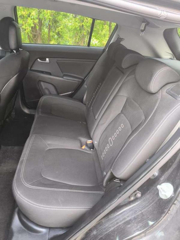Black Kia Sportage 2012 in Kaunas, with an engine capacity of 2.00 L and mileage of 217 thousand km for 7500 €, photo 8 on AUTOMOTO.COM.LV