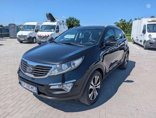 Black Kia Sportage 2012 in Taurage, with an engine capacity of 2.00 L and mileage of 245 thousand km for 6500 €, photo 1 on AUTOMOTO.COM.LV