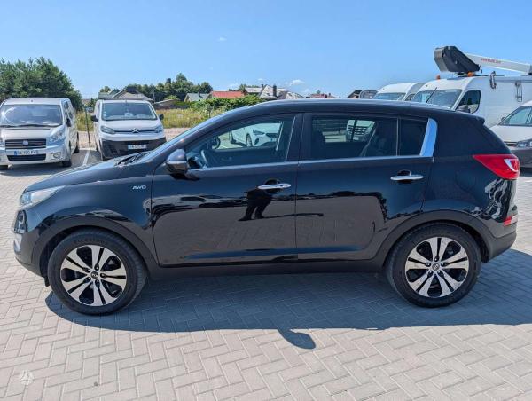 Black Kia Sportage 2012 in Taurage, with an engine capacity of 2.00 L and mileage of 245 thousand km for 6500 €, photo 9 on AUTOMOTO.COM.LV