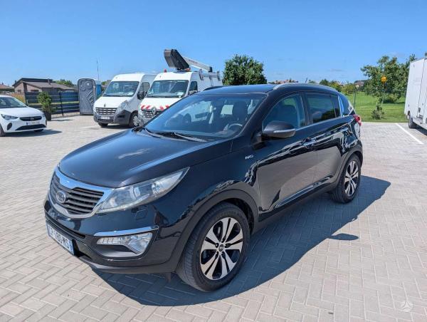 Black Kia Sportage 2012 in Taurage, with an engine capacity of 2.00 L and mileage of 245 thousand km for 6500 €, photo 10 on AUTOMOTO.COM.LV