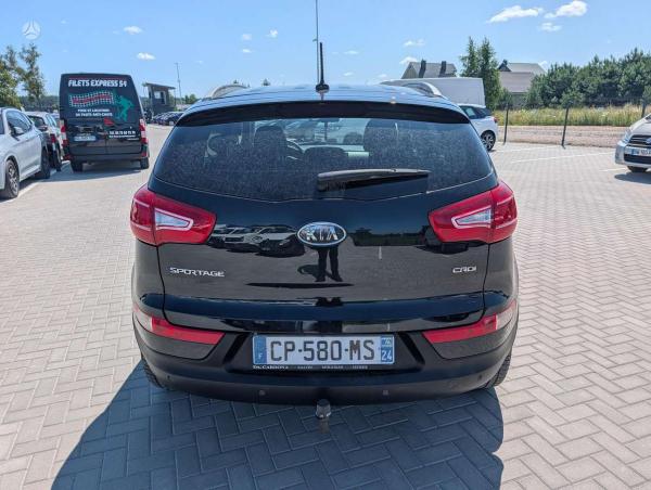 Black Kia Sportage 2012 in Taurage, with an engine capacity of 2.00 L and mileage of 245 thousand km for 6500 €, photo 7 on AUTOMOTO.COM.LV
