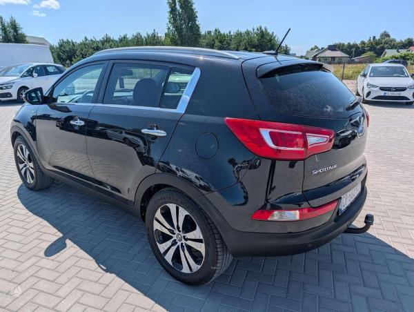 Black Kia Sportage 2012 in Taurage, with an engine capacity of 2.00 L and mileage of 245 thousand km for 6500 €, photo 8 on AUTOMOTO.COM.LV