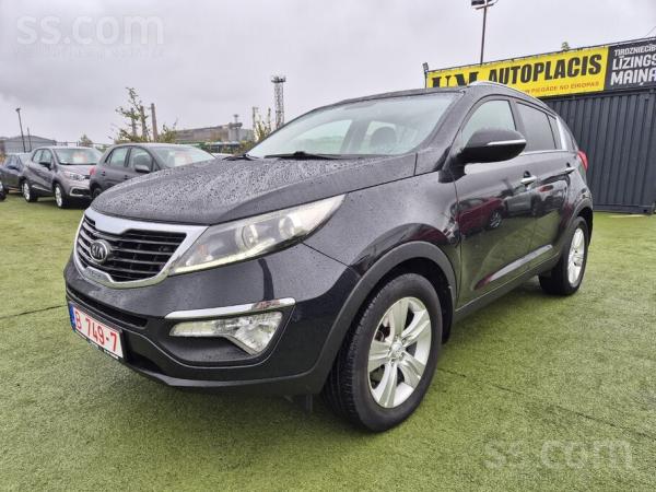 Black Kia Sportage 2012 in Liepaja, with an engine capacity of 2.00 L and mileage of 224 thousand km for 7100 €, photo 1 on AUTOMOTO.COM.LV