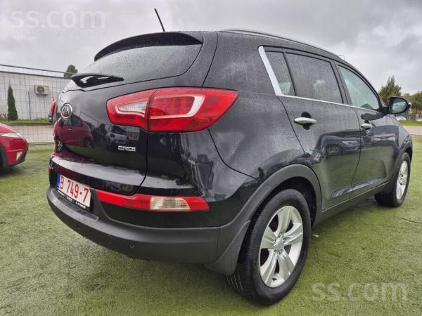 Black Kia Sportage 2012 in Liepaja, with an engine capacity of 2.00 L and mileage of 224 thousand km for 7100 €, photo 6 on AUTOMOTO.COM.LV