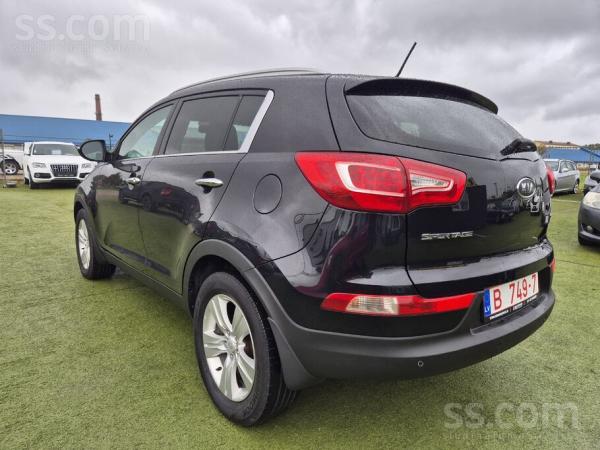 Black Kia Sportage 2012 in Liepaja, with an engine capacity of 2.00 L and mileage of 224 thousand km for 7100 €, photo 8 on AUTOMOTO.COM.LV