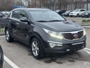 Black Kia Sportage 2013 in Marijampole, with an engine capacity of 1.69 L and mileage of 258 thousand km for 6300 €, photo  on AUTOMOTO.COM.LV