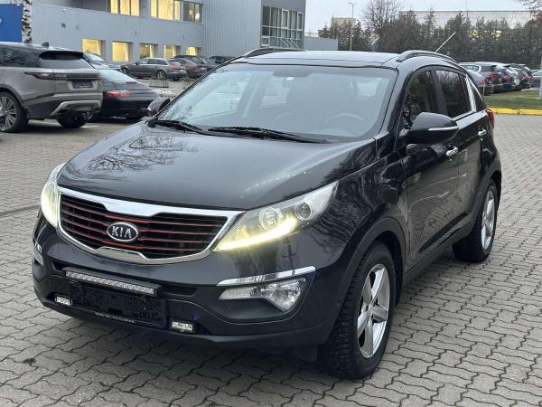 Black Kia Sportage 2013 in Marijampole, with an engine capacity of 1.69 L and mileage of 258 thousand km for 6300 €, photo 2 on AUTOMOTO.COM.LV