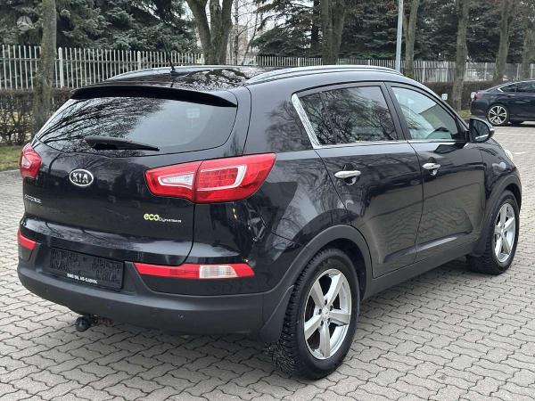 Black Kia Sportage 2013 in Marijampole, with an engine capacity of 1.69 L and mileage of 258 thousand km for 6300 €, photo 6 on AUTOMOTO.COM.LV