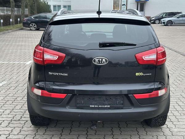 Black Kia Sportage 2013 in Marijampole, with an engine capacity of 1.69 L and mileage of 258 thousand km for 6300 €, photo 7 on AUTOMOTO.COM.LV