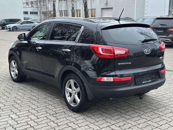 Black Kia Sportage 2013 in Marijampole, with an engine capacity of 1.69 L and mileage of 258 thousand km for 6300 €, photo 8 on AUTOMOTO.COM.LV