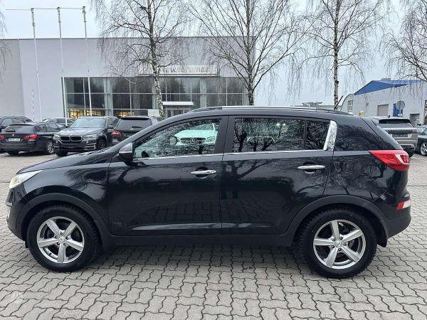 Black Kia Sportage 2013 in Marijampole, with an engine capacity of 1.69 L and mileage of 258 thousand km for 6300 €, photo 9 on AUTOMOTO.COM.LV
