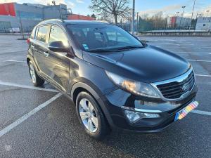 Black Kia Sportage 2013 in Panevezys, with an engine capacity of 1.69 L and mileage of 165 thousand km for 4650 €, photo  on AUTOMOTO.COM.LV