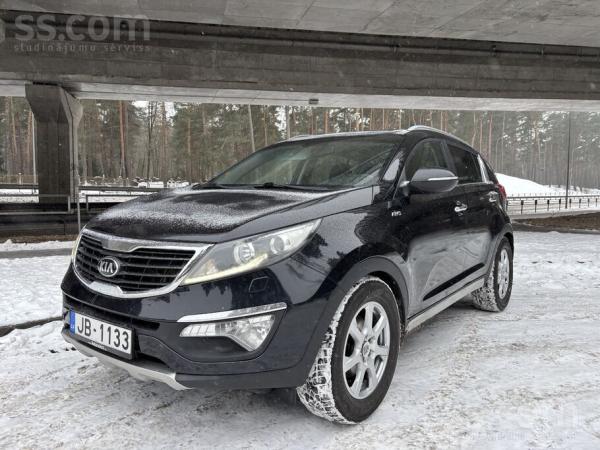 Black Kia Sportage 2013 in Riga, with an engine capacity of 2.00 L and mileage of 0 thousand km for 6990 €, photo 1 on AUTOMOTO.COM.LV