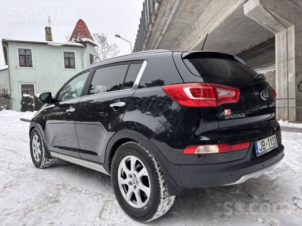 Black Kia Sportage 2013 in Riga, with an engine capacity of 2.00 L and mileage of 0 thousand km for 6990 €, photo 4 on AUTOMOTO.COM.LV