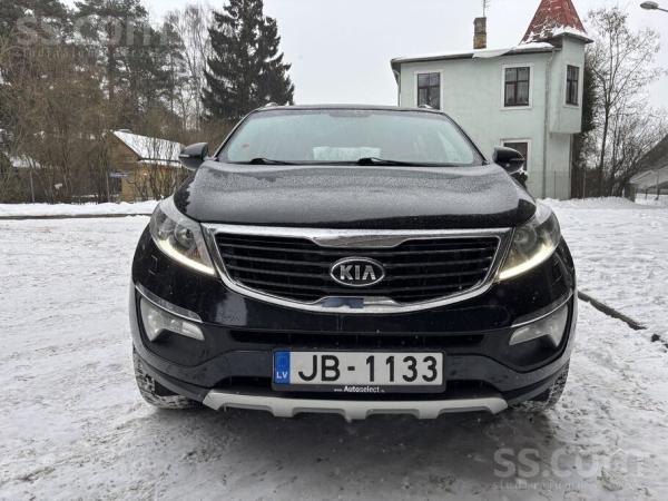 Black Kia Sportage 2013 in Riga, with an engine capacity of 2.00 L and mileage of 0 thousand km for 6990 €, photo 10 on AUTOMOTO.COM.LV