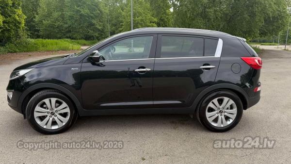 Black Kia Sportage 2013 in Tallinn, with an engine capacity of 2.00 L and mileage of 127 thousand km for 9500 €, photo 4 on AUTOMOTO.COM.LV