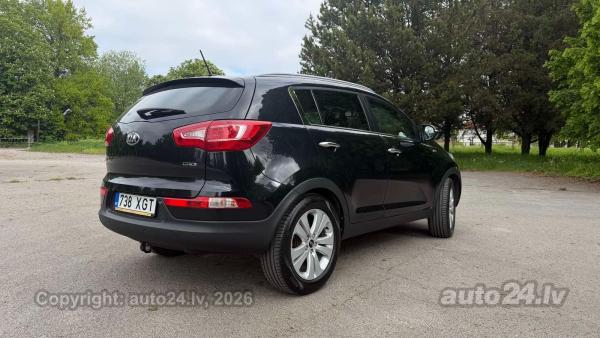 Black Kia Sportage 2013 in Tallinn, with an engine capacity of 2.00 L and mileage of 127 thousand km for 9500 €, photo 5 on AUTOMOTO.COM.LV