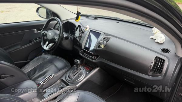 Black Kia Sportage 2013 in Tallinn, with an engine capacity of 2.00 L and mileage of 127 thousand km for 9500 €, photo 9 on AUTOMOTO.COM.LV