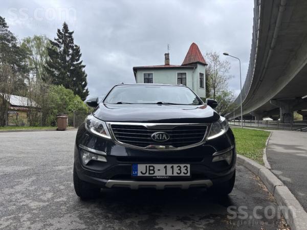 Black Kia Sportage 2013 in Riga, with an engine capacity of 2.00 L and mileage of 0 thousand km for 6700 €, photo 4 on AUTOMOTO.COM.LV