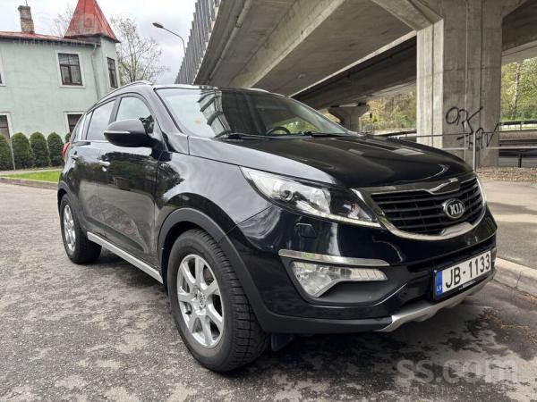 Black Kia Sportage 2013 in Riga, with an engine capacity of 2.00 L and mileage of 0 thousand km for 6700 €, photo 5 on AUTOMOTO.COM.LV