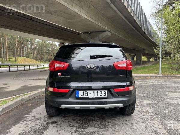 Black Kia Sportage 2013 in Riga, with an engine capacity of 2.00 L and mileage of 0 thousand km for 6700 €, photo 8 on AUTOMOTO.COM.LV