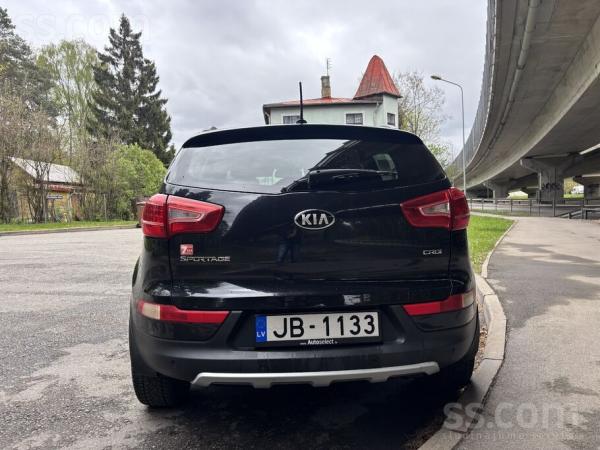 Black Kia Sportage 2013 in Riga, with an engine capacity of 2.00 L and mileage of 0 thousand km for 6700 €, photo 10 on AUTOMOTO.COM.LV