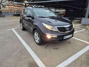 Black Kia Sportage 2013 in Siauliai, with an engine capacity of 1.69 L and mileage of 210 thousand km for 6800 €, photo  on AUTOMOTO.COM.LV