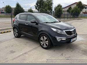 Black Kia Sportage 2013 in Marijampole, with an engine capacity of 2.00 L and mileage of 140 thousand km for 7900 €, photo  on AUTOMOTO.COM.LV