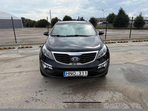 Black Kia Sportage 2013 in Marijampole, with an engine capacity of 2.00 L and mileage of 140 thousand km for 7900 €, photo 2 on AUTOMOTO.COM.LV