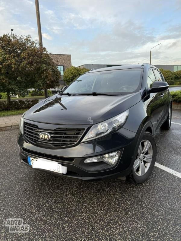 Black Kia Sportage 2013 in Vilnius, with an engine capacity of 2.00 L and mileage of 262 thousand km for 5950 €, photo 1 on AUTOMOTO.COM.LV