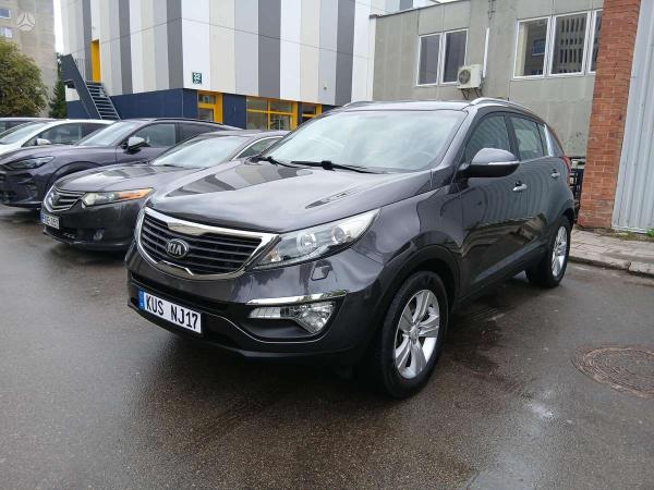 Black Kia Sportage 2013 in Siauliai, with an engine capacity of 1.69 L and mileage of 240 thousand km for 6450 €, photo 3 on AUTOMOTO.COM.LV
