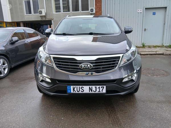 Black Kia Sportage 2013 in Siauliai, with an engine capacity of 1.69 L and mileage of 240 thousand km for 6450 €, photo 6 on AUTOMOTO.COM.LV