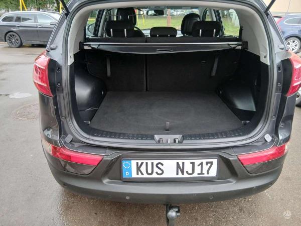 Black Kia Sportage 2013 in Siauliai, with an engine capacity of 1.69 L and mileage of 240 thousand km for 6450 €, photo 7 on AUTOMOTO.COM.LV