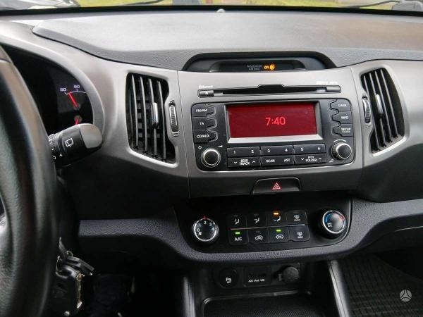 Black Kia Sportage 2013 in Siauliai, with an engine capacity of 1.69 L and mileage of 240 thousand km for 6450 €, photo 11 on AUTOMOTO.COM.LV