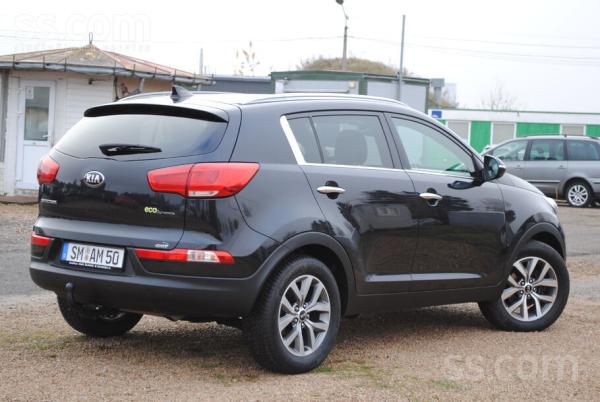 Black Kia Sportage 2014 in Riga, with an engine capacity of 1.70 L and mileage of 189 thousand km for 8990 €, photo 2 on AUTOMOTO.COM.LV