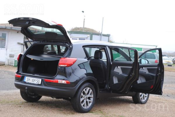 Black Kia Sportage 2014 in Riga, with an engine capacity of 1.70 L and mileage of 189 thousand km for 8990 €, photo 7 on AUTOMOTO.COM.LV