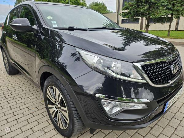 Black Kia Sportage 2014 in Taurage, with an engine capacity of 1.69 L and mileage of 248 thousand km for 7600 €, photo 1 on AUTOMOTO.COM.LV