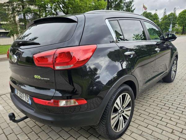 Black Kia Sportage 2014 in Taurage, with an engine capacity of 1.69 L and mileage of 248 thousand km for 7600 €, photo 5 on AUTOMOTO.COM.LV