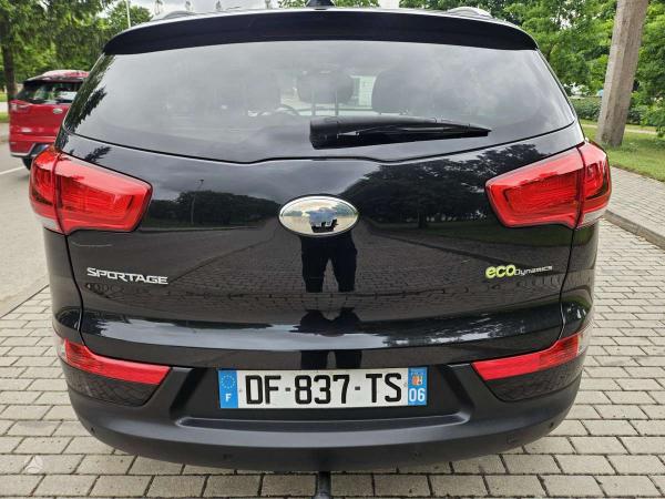 Black Kia Sportage 2014 in Taurage, with an engine capacity of 1.69 L and mileage of 248 thousand km for 7600 €, photo 6 on AUTOMOTO.COM.LV
