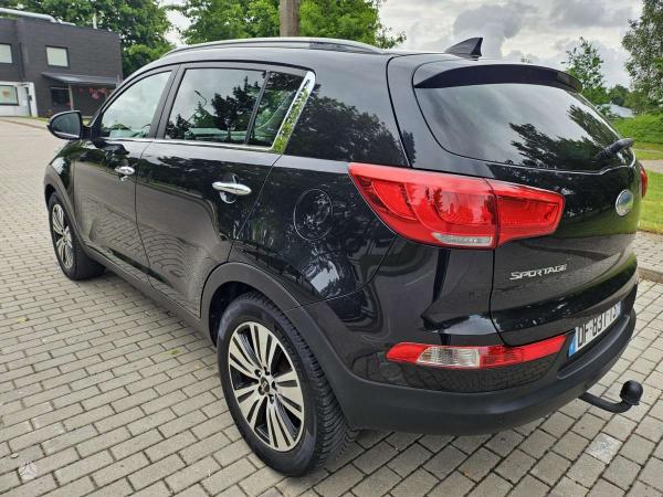 Black Kia Sportage 2014 in Taurage, with an engine capacity of 1.69 L and mileage of 248 thousand km for 7600 €, photo 7 on AUTOMOTO.COM.LV