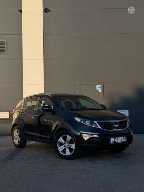 Black Kia Sportage 2014 in Vilnius, with an engine capacity of 2.00 L and mileage of 103 thousand km for 8399 €, photo 1 on AUTOMOTO.COM.LV
