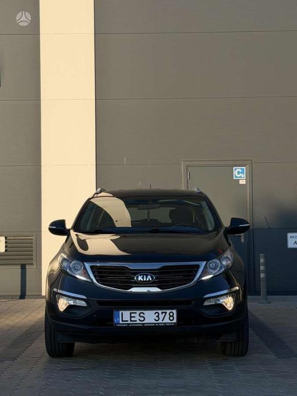 Black Kia Sportage 2014 in Vilnius, with an engine capacity of 2.00 L and mileage of 103 thousand km for 8399 €, photo 2 on AUTOMOTO.COM.LV