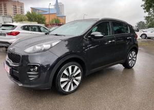 Black Kia Sportage 2016 in Riga, with an engine capacity of 1.70 L and mileage of 257 thousand km for 10750 €, photo  on AUTOMOTO.COM.LV