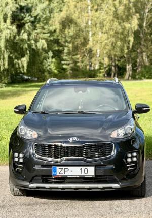 Black Kia Sportage 2016 in Riga, with an engine capacity of 2.00 L and mileage of 202 thousand km for 11900 €, photo 1 on AUTOMOTO.COM.LV