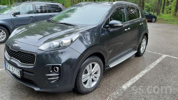 Black Kia Sportage 2017 in Riga, with an engine capacity of 1.70 L and mileage of 113 thousand km for 12000 €, photo 1 on AUTOMOTO.COM.LV