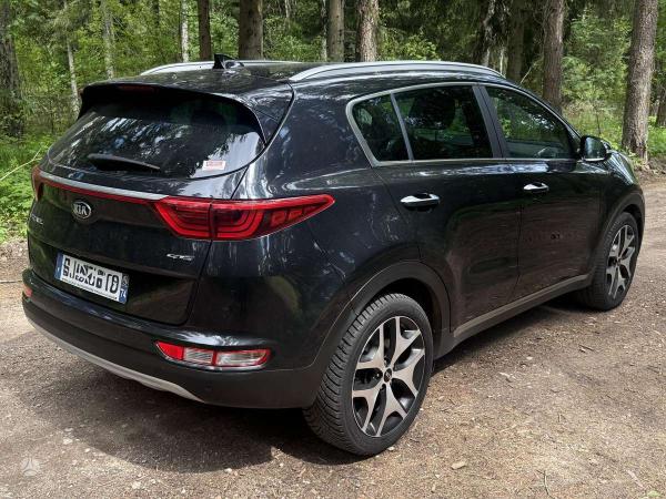 Black Kia Sportage 2017 in Taurage, with an engine capacity of 1.69 L and mileage of 235 thousand km for 10600 €, photo 4 on AUTOMOTO.COM.LV