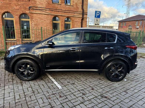 Black Kia Sportage 2018 in Vilnius, with an engine capacity of 2.00 L and mileage of 78 thousand km for 17900 €, photo 6 on AUTOMOTO.COM.LV