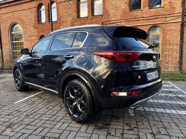Black Kia Sportage 2018 in Vilnius, with an engine capacity of 2.00 L and mileage of 80 thousand km for 17450 €, photo 4 on AUTOMOTO.COM.LV