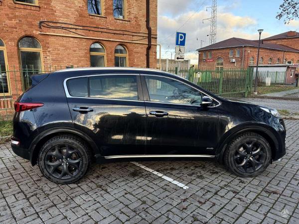 Black Kia Sportage 2018 in Vilnius, with an engine capacity of 2.00 L and mileage of 80 thousand km for 17450 €, photo 6 on AUTOMOTO.COM.LV
