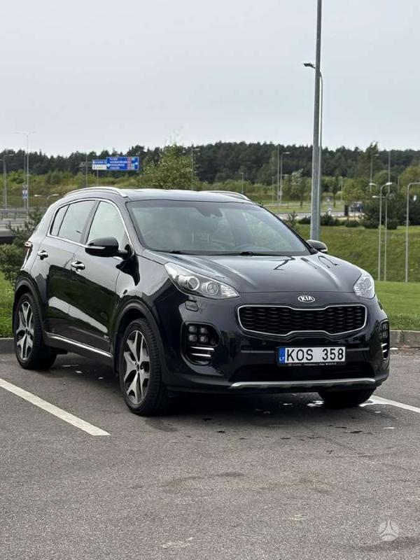 Black Kia Sportage 2018 in Vilnius, with an engine capacity of 1.59 L and mileage of 76 thousand km for 15900 €, photo 2 on AUTOMOTO.COM.LV